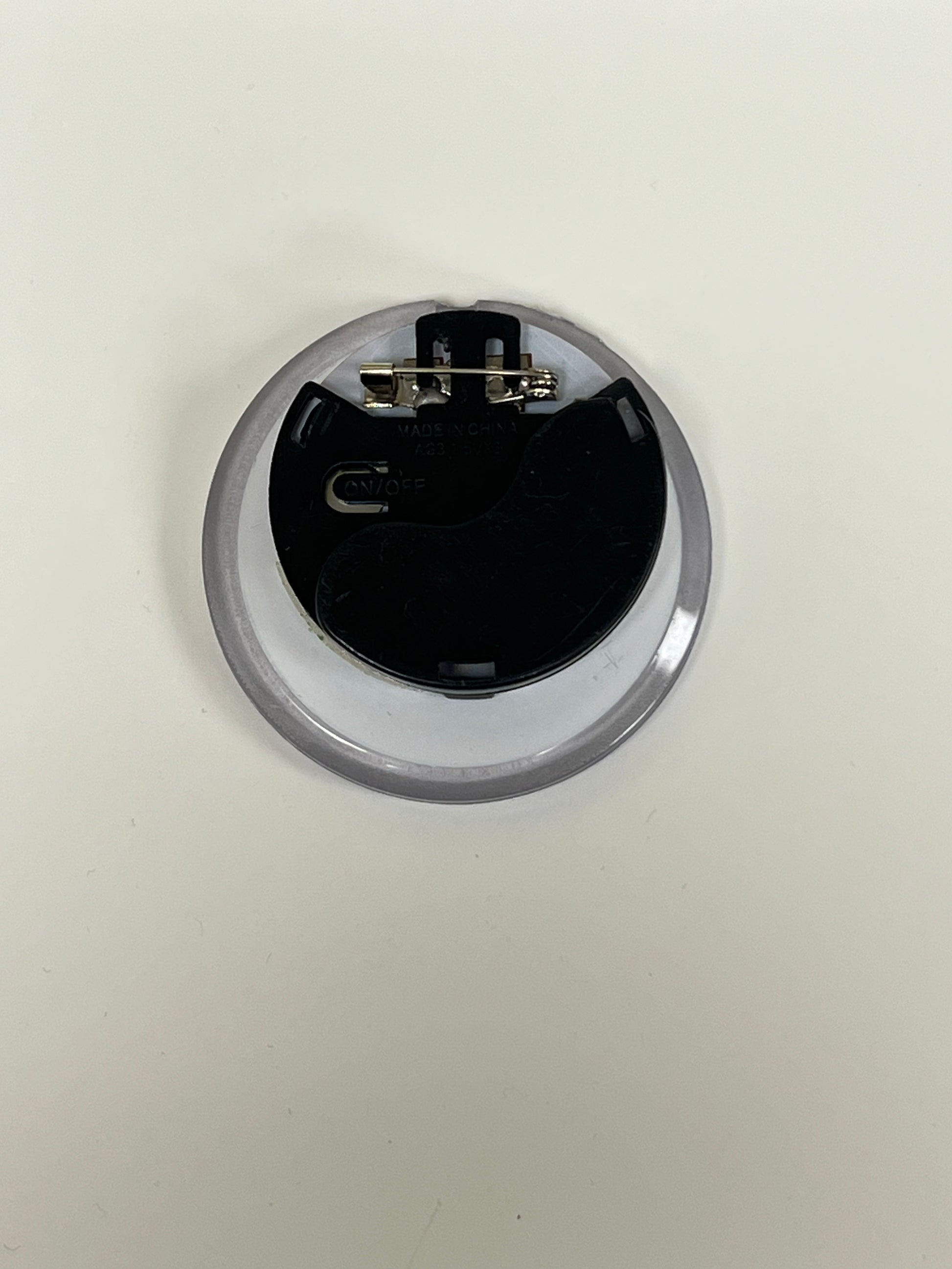 2" UNCG Spartan Lockup Blue Led Badge- 3 Functions – swag.uncg.edu